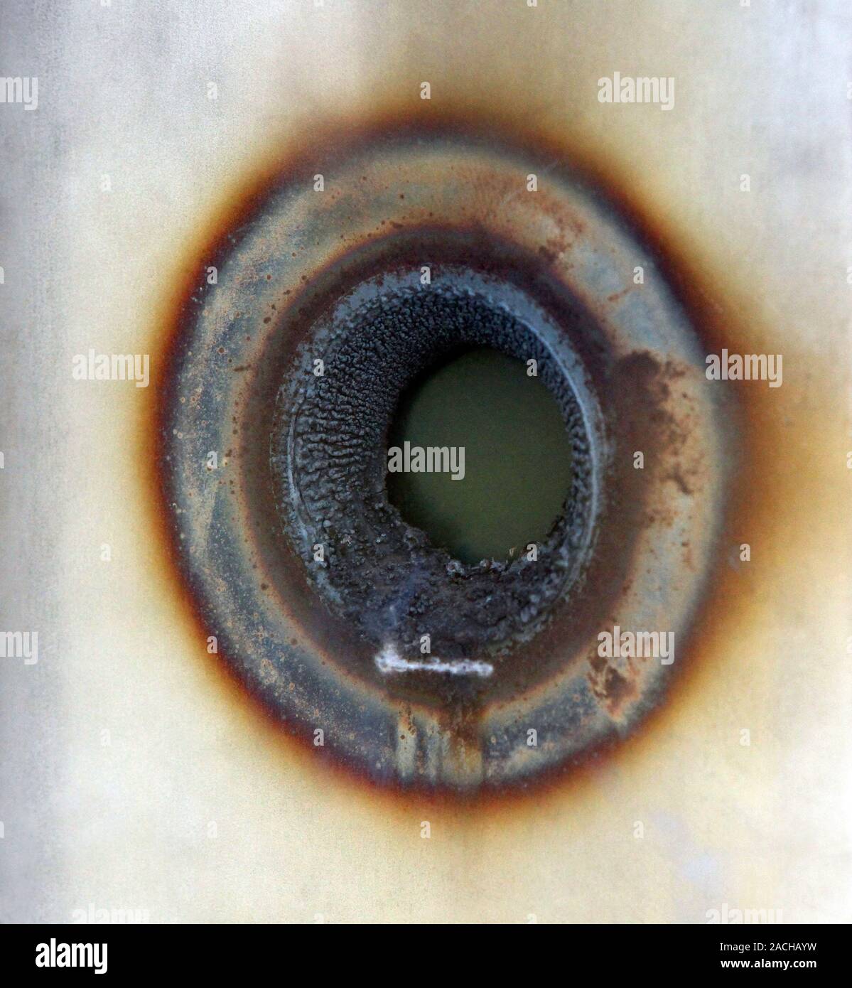 Solar power tower heat demonstration. Hole melted in steel using the ...