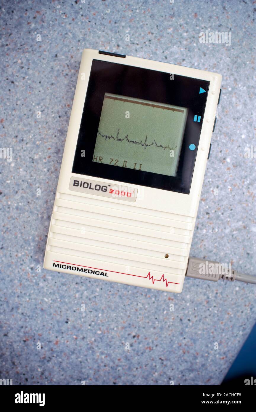 Heart monitoring device. Close-up of a portable device used to display ...