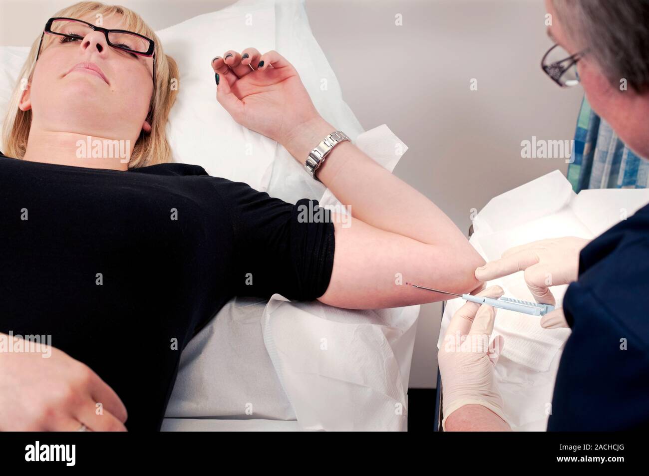 Contraceptive implant. Woman having a tube filled with progestin, a ...