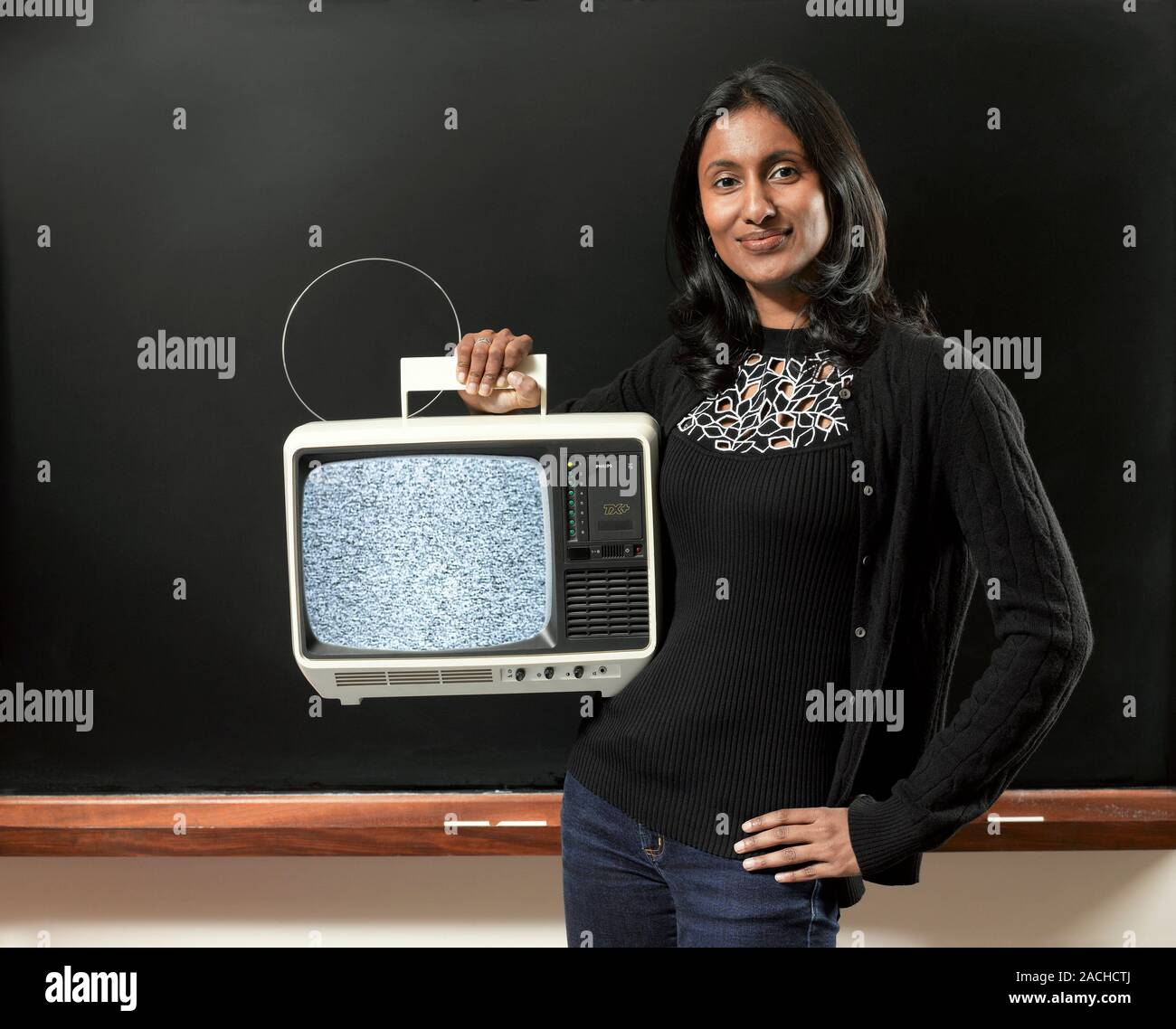 Hiranya Peiris, Sri Lankan-born British cosmologist, holding a ...