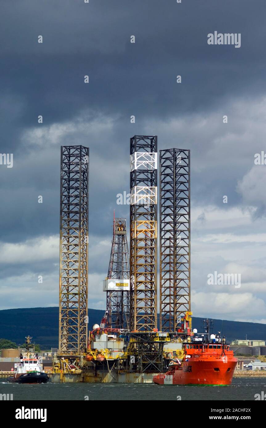 Jackup oil drilling rig. Ensco 80 oil rig being towed up the Cromarty ...