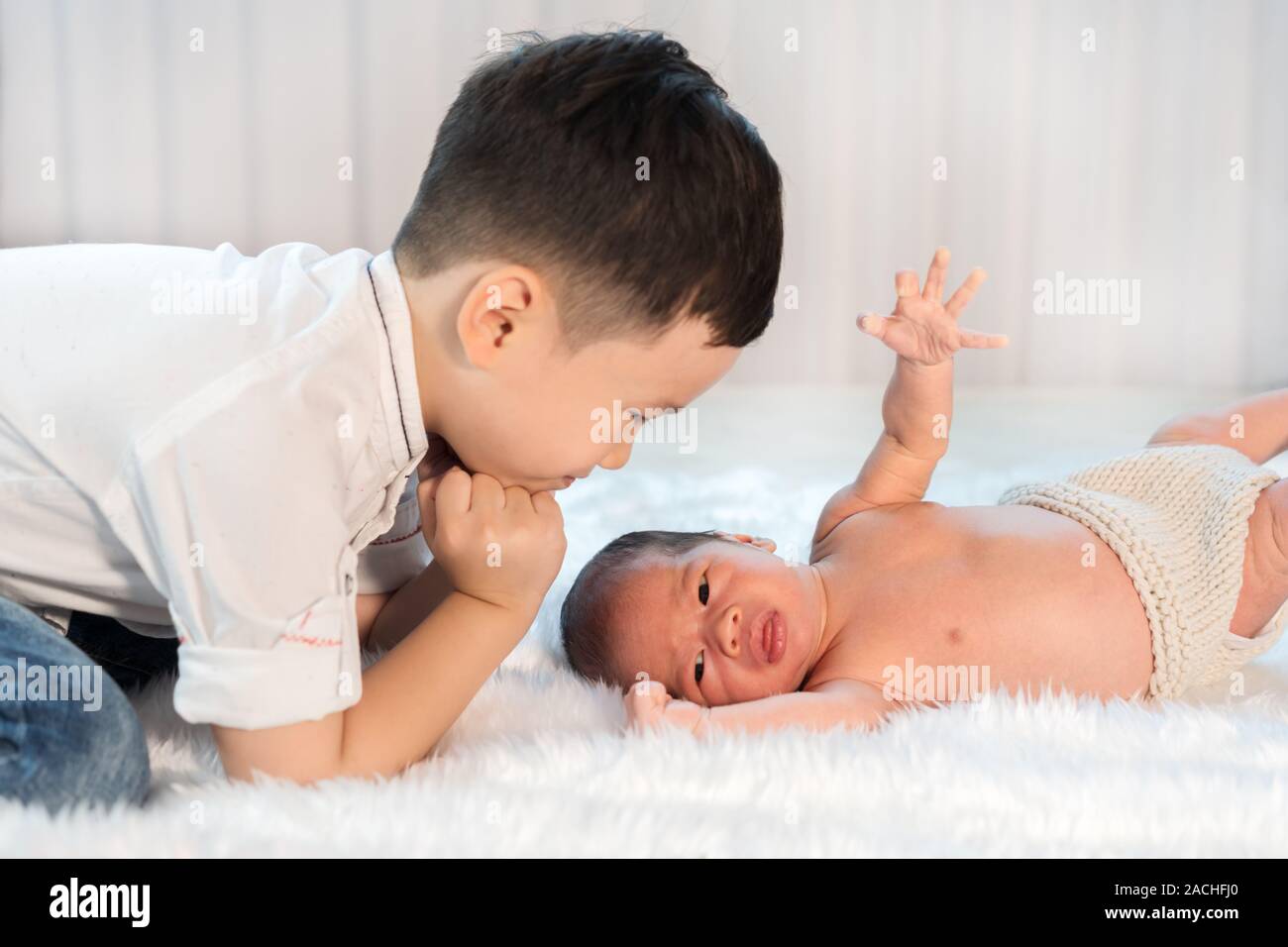 Older sister and two younger brothers hi-res stock photography and ...