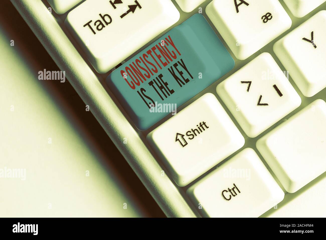 Writing note showing Consistency Is The Key. Business concept for full ...
