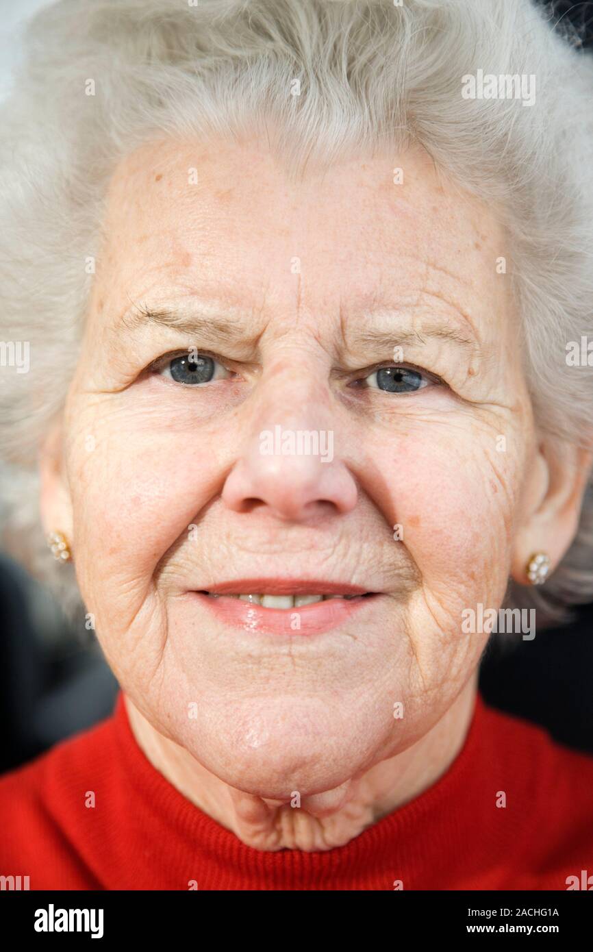Elderly woman smiling Stock Photo - Alamy