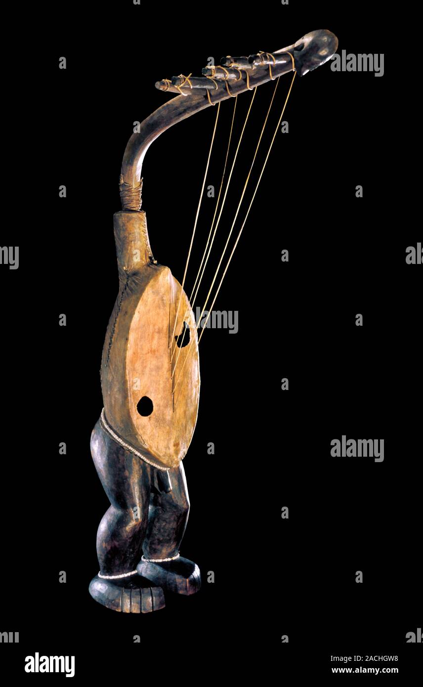 African harp. Harp carved in the form of a human figure by the Ngbaka ...