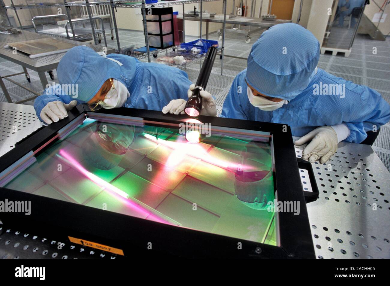 Laser Megajoule amplifier production. Engineers in a clean room ... Laser Megajoule amplifier production. Engineers in a clean room ...