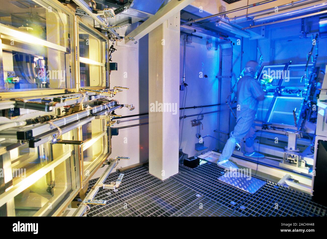 Laser Megajoule testing. Engineer using ultraviolet light to check a ...