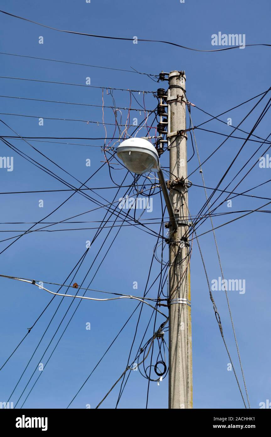 Telegraph pole with street light. Photographed in Mexico Stock Photo ...