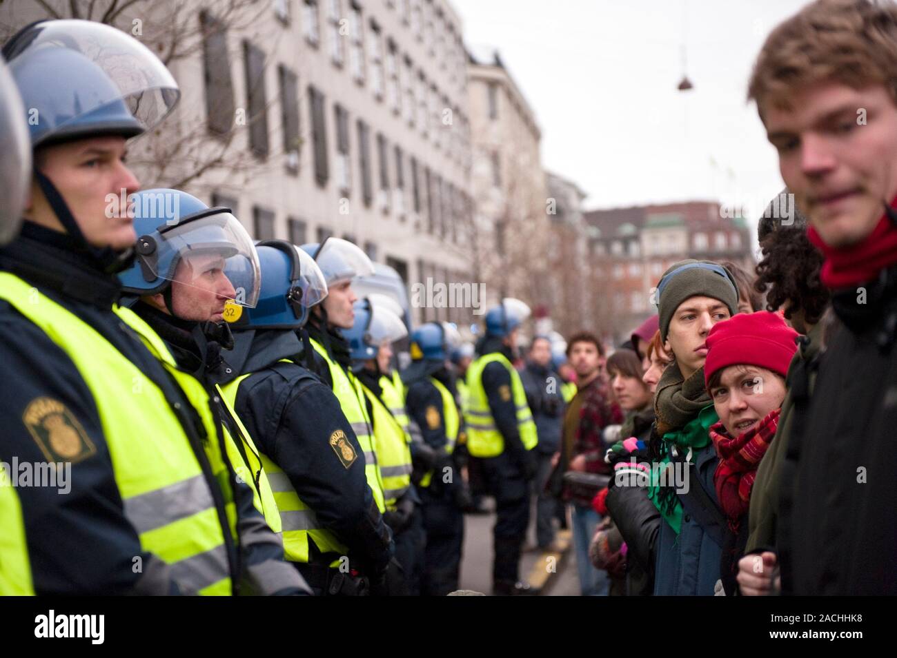 Climate change protest, Copenhagen 2009. Protestors facing off against ...