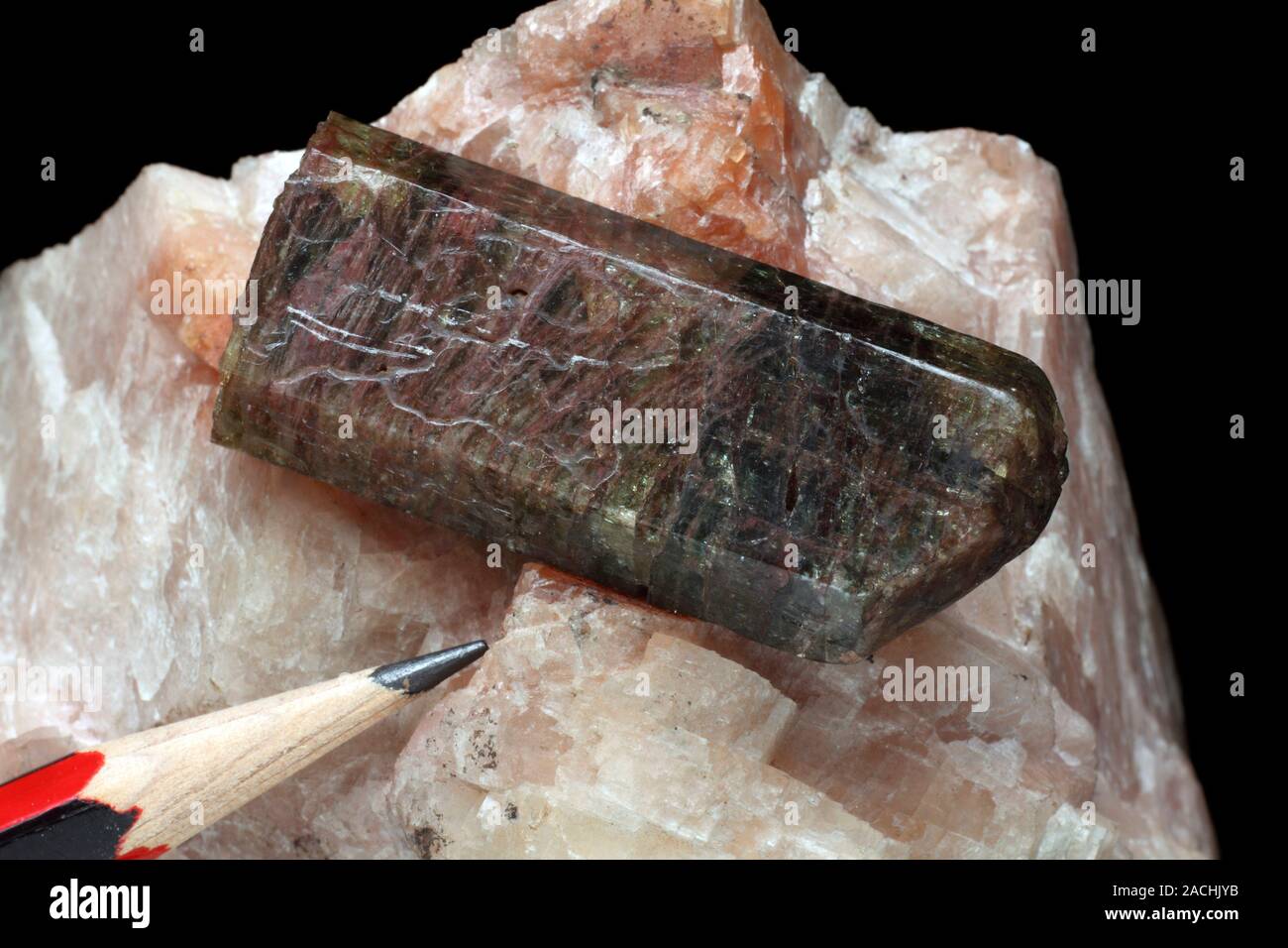 Apatite crystal on its host rock. Apatite (a calcium phosphate mineral ...