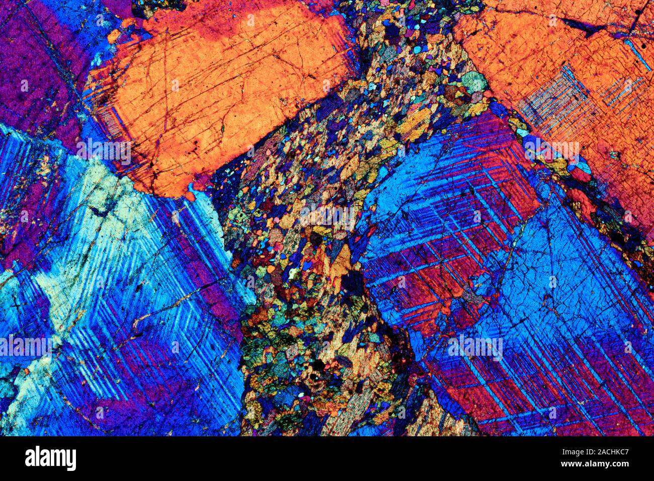 Polarised light micrograph of a thin section of granite, an igneous ...