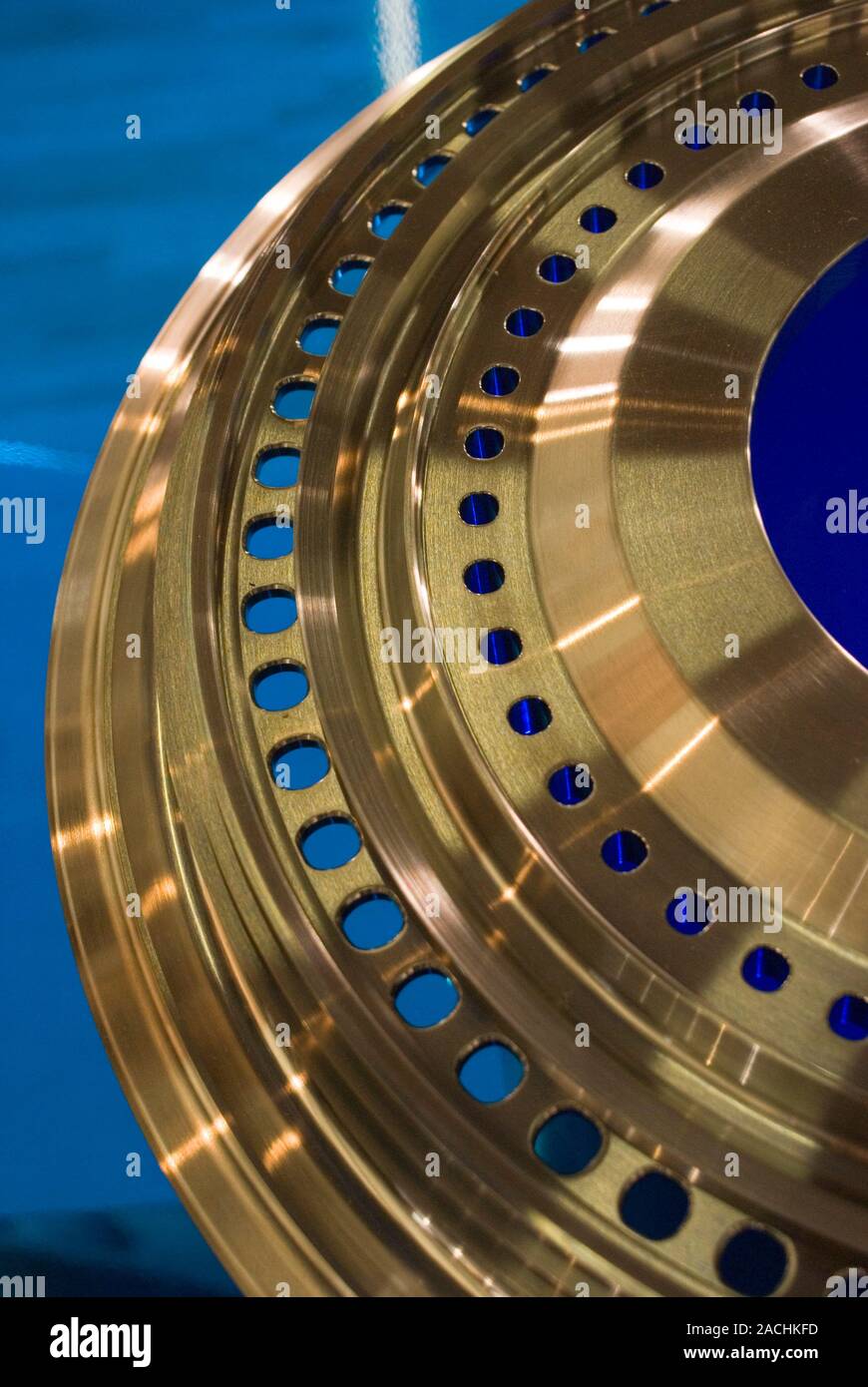 Aircraft engine component (cast metal ring with attachment holes). An ...