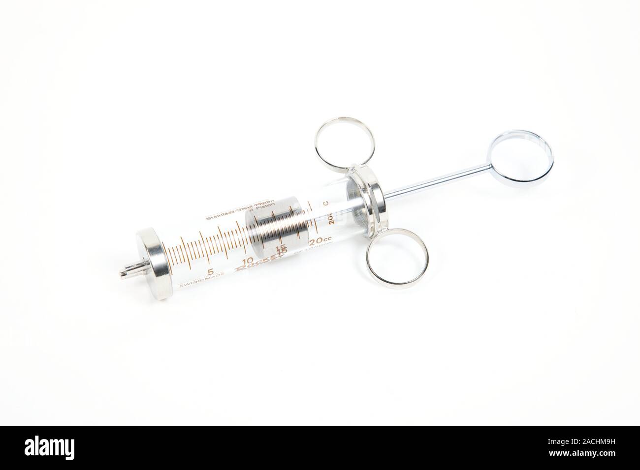 Glass syringe with finger grips Stock Photo - Alamy
