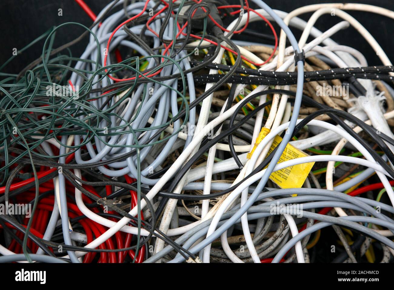 Tangled electrical cables Stock Photo - Alamy