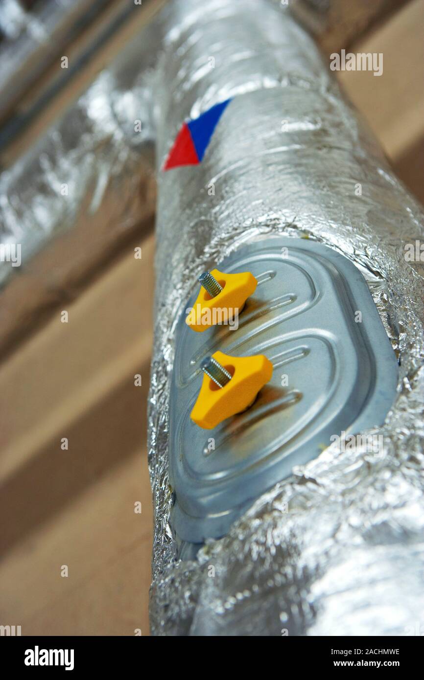 Insulated heating pipes in an industrial heating system Stock Photo - Alamy