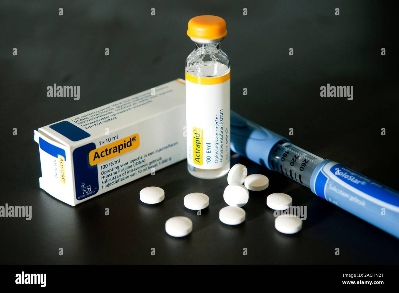 Insulin and statins. Pre-filled insulin pen (blue), vial of insulin ...