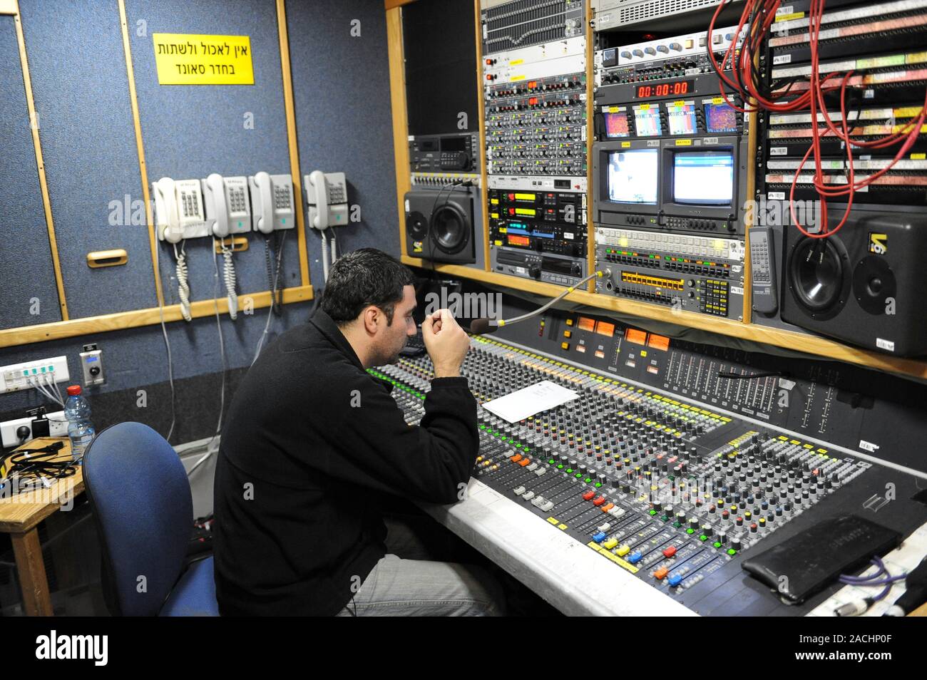 Sound engineer in a control room Stock Photo - Alamy
