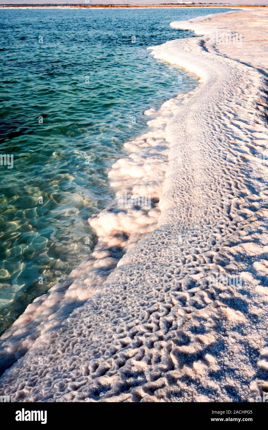 Salt formation caused by the evaporation of the water on the shore ...