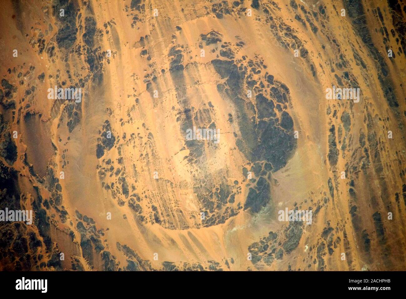 Aorounga Crater, satellite image. This impact crater is in the Sahara ...