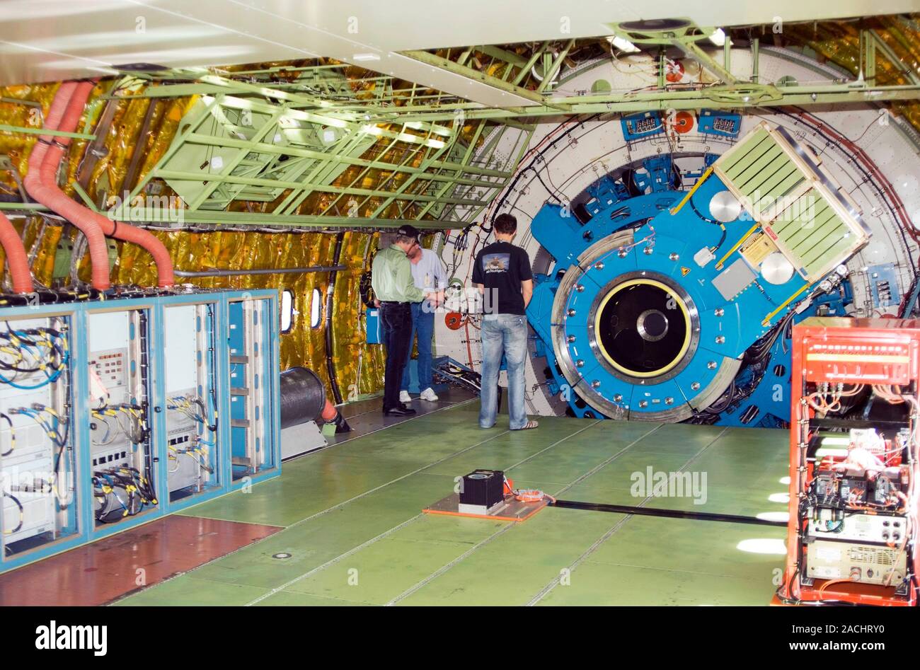 SOFIA airborne observatory installation. Technicians checking the mounting structure for the ...