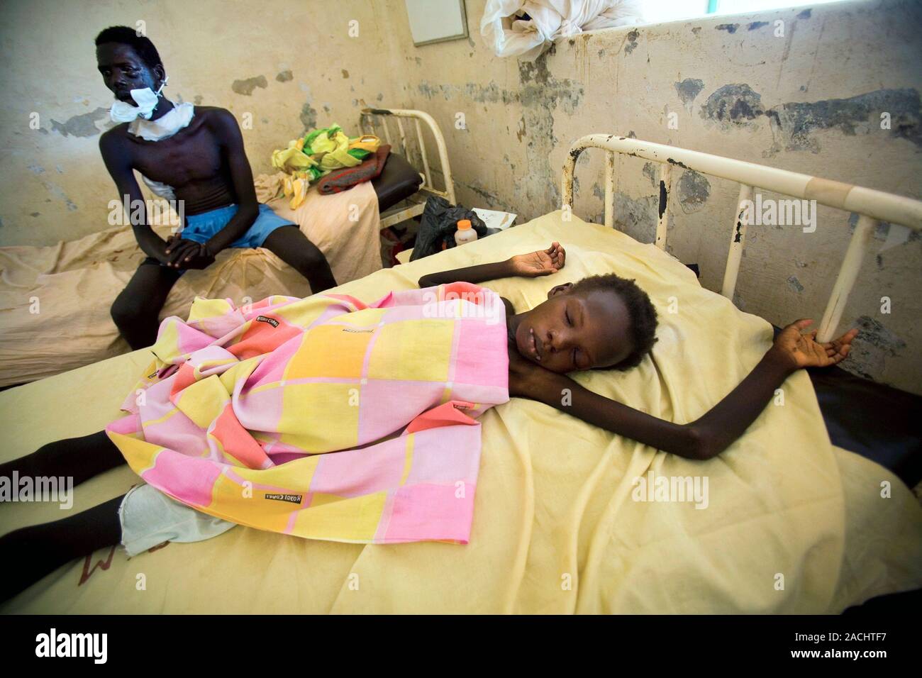African hospital. Sick child asleep in a hospital. Photographed in Juba ...