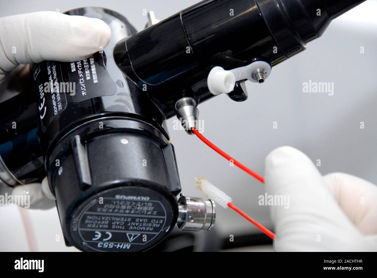 Endoscopy. Close-up of a hospital worker cleaning and sterilising an ...