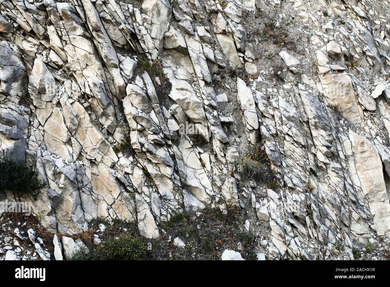 Rock bedding in a cliff. The vertical lines seen in this cliff-face ...