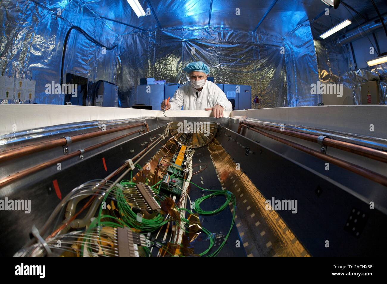Cms Pixel Detector Researcher Assembling Part Of The Pixel Detector For The Cms Compact Muon
