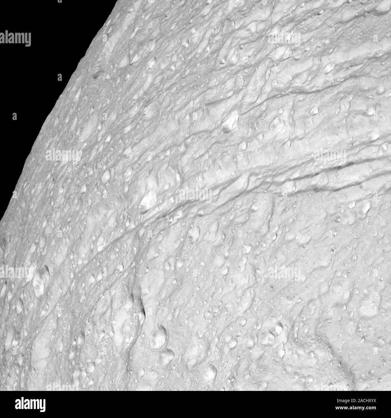 Saturn's moon Tethys. Cassini spacecraft image of part of the surface ...