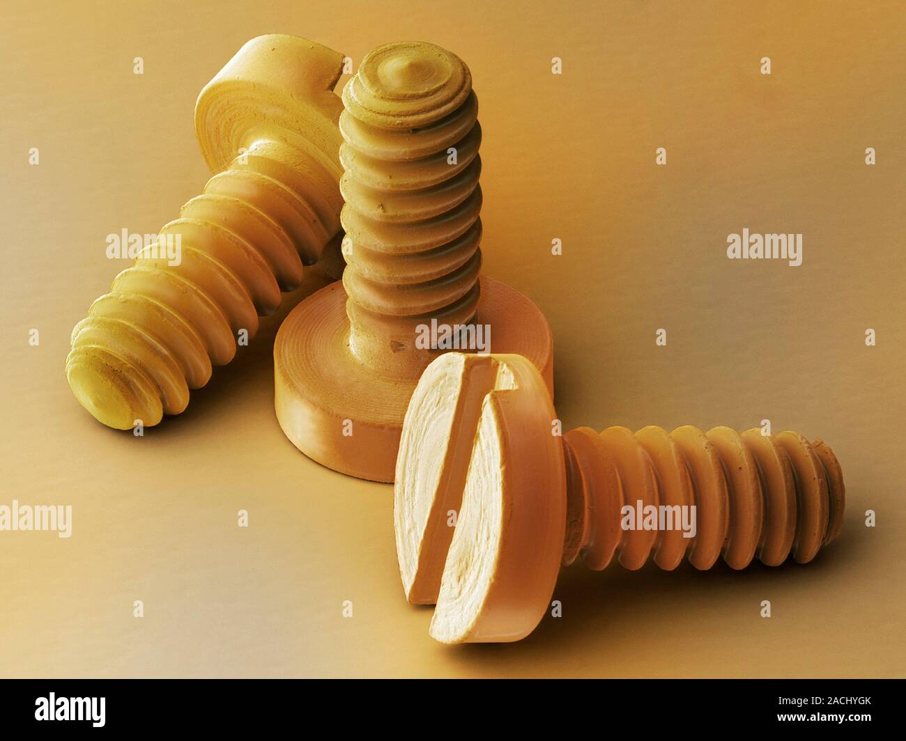 Watchmaker's brass screws, coloured scanning electron micrograph (SEM ...