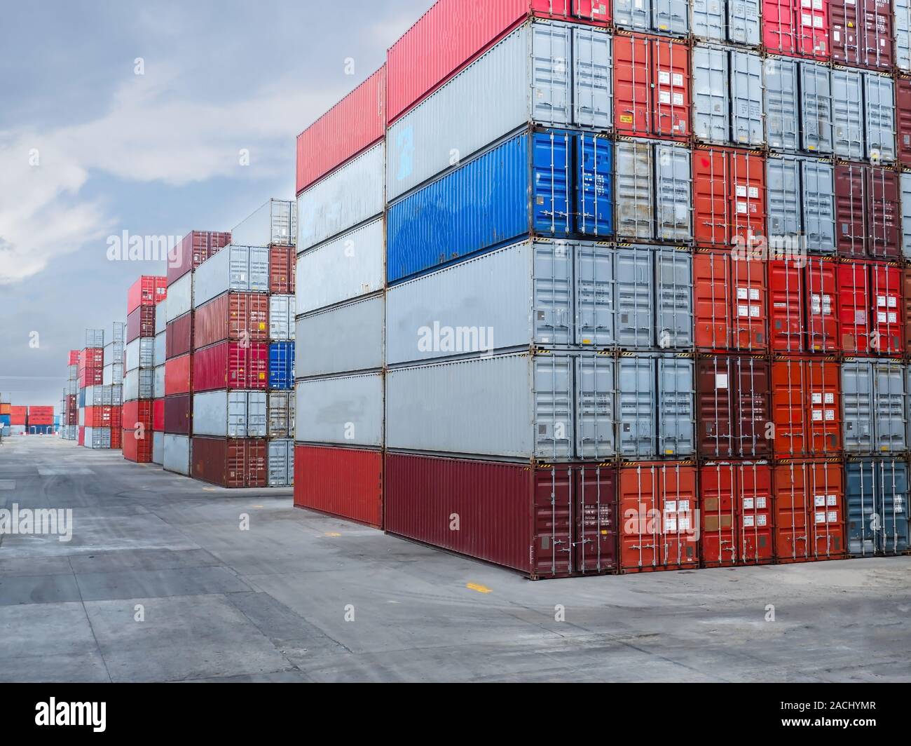 Container stack in the port of import and export industry Stock Photo ...