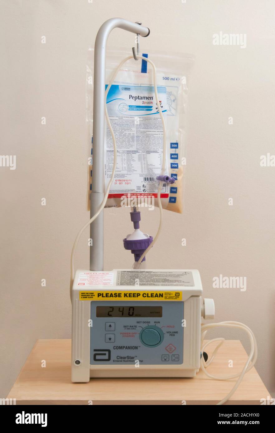 Milk pump. View of a pump used to deliver a peptide-based liquid food ...