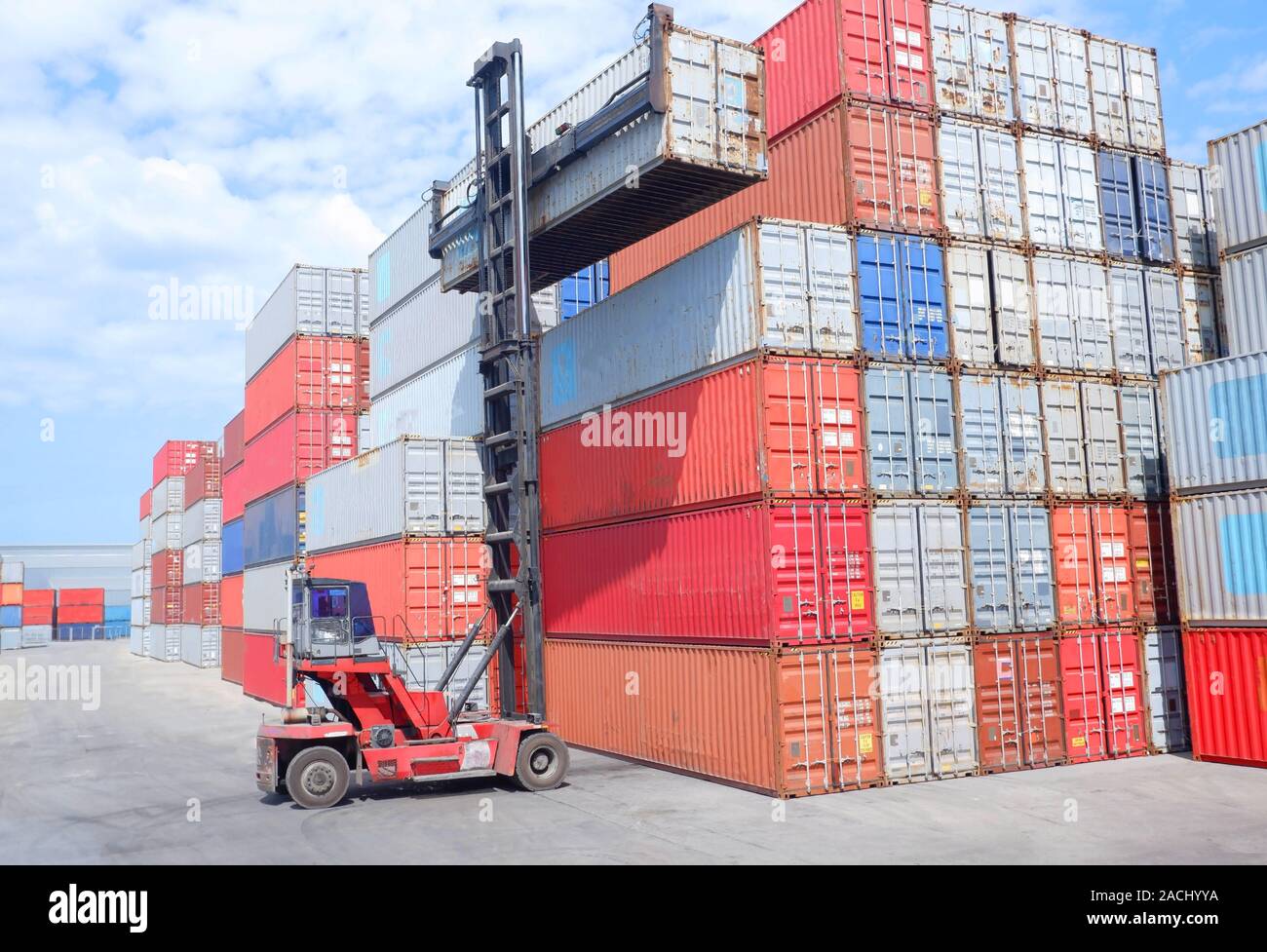 Container handlers working in port import and export industry Stock ...