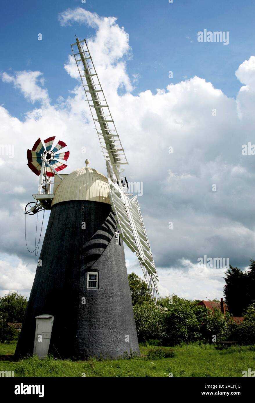 Converted windmill. This four-bladed windmill has been converted into a ...