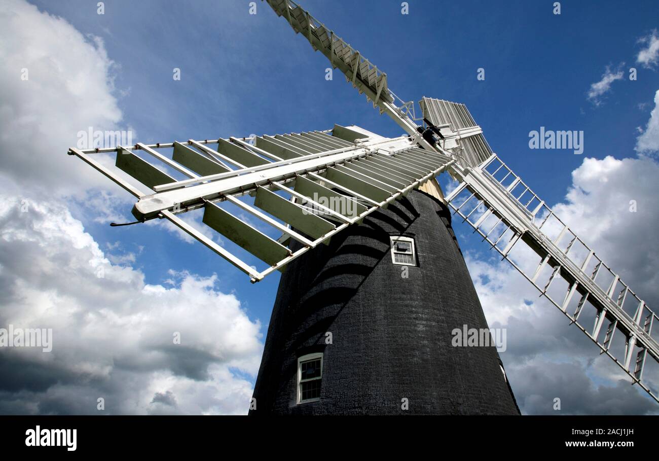 Converted windmill. This four-bladed windmill has been converted into a ...