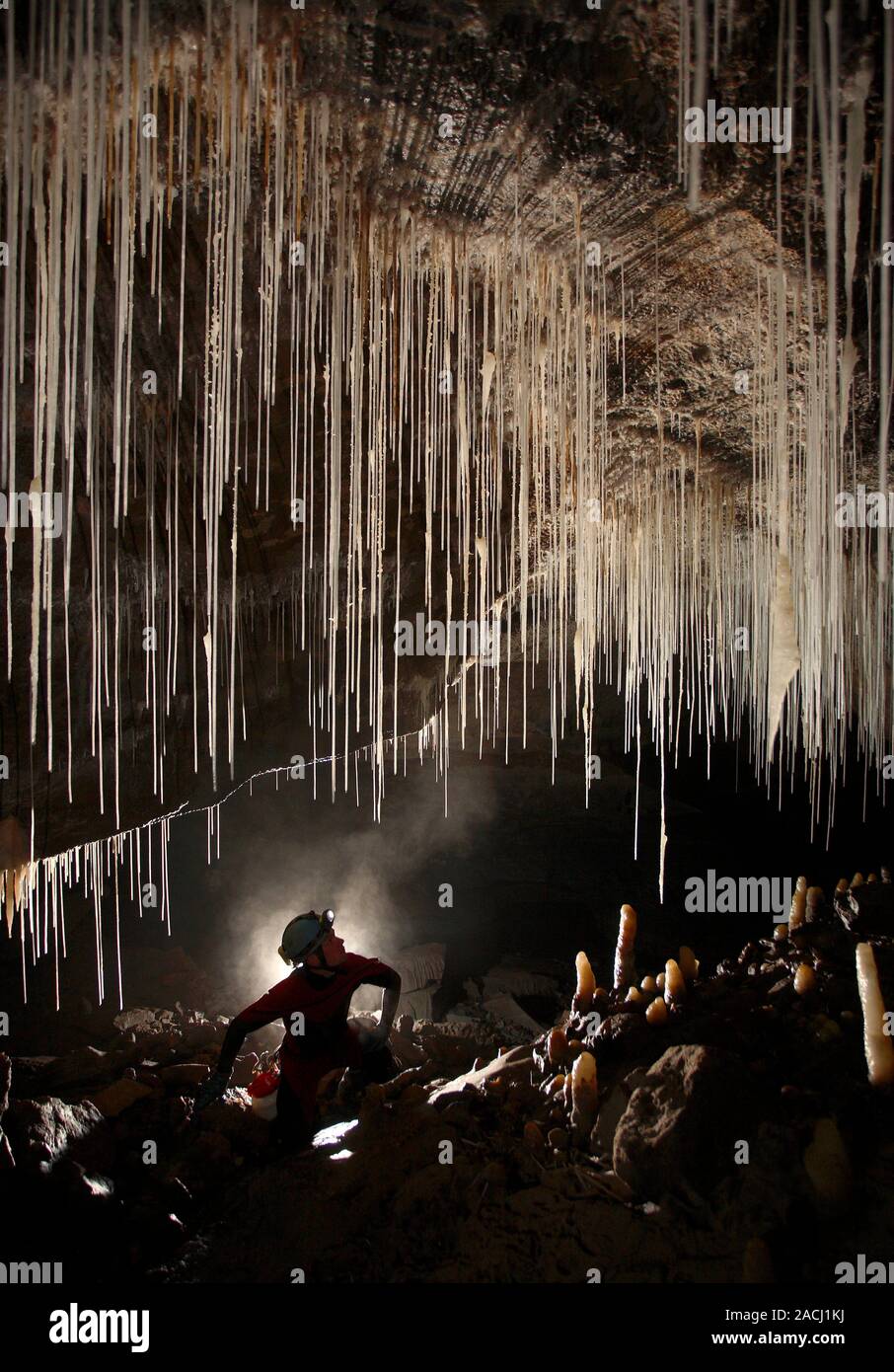 Cave stalagtites. Delicate calcite stalagtite straw formations hanging ...