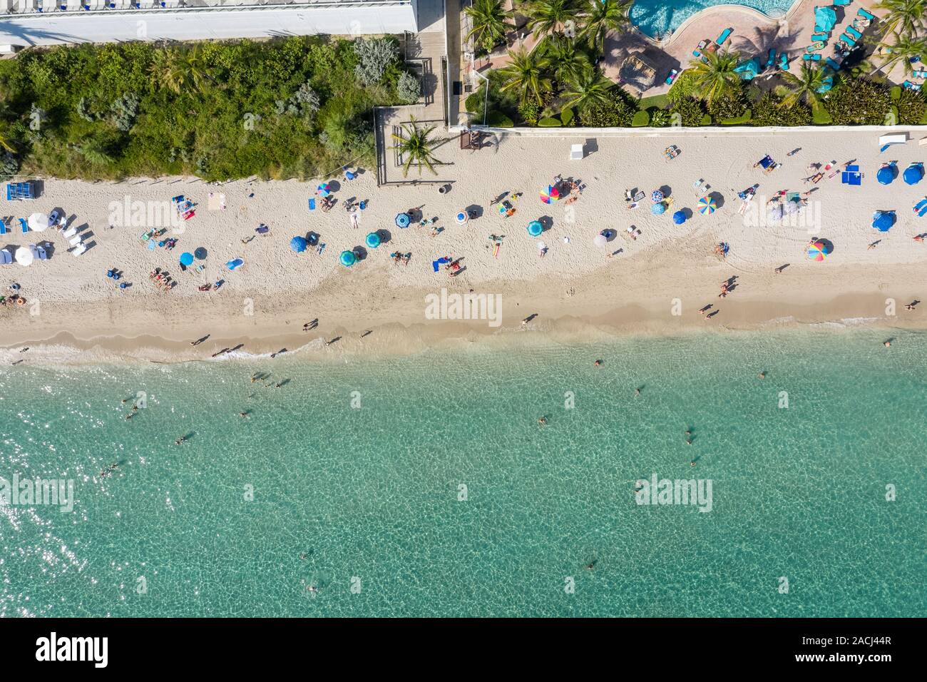 Aerial view of people having a good time on the beach in Miami beach ...