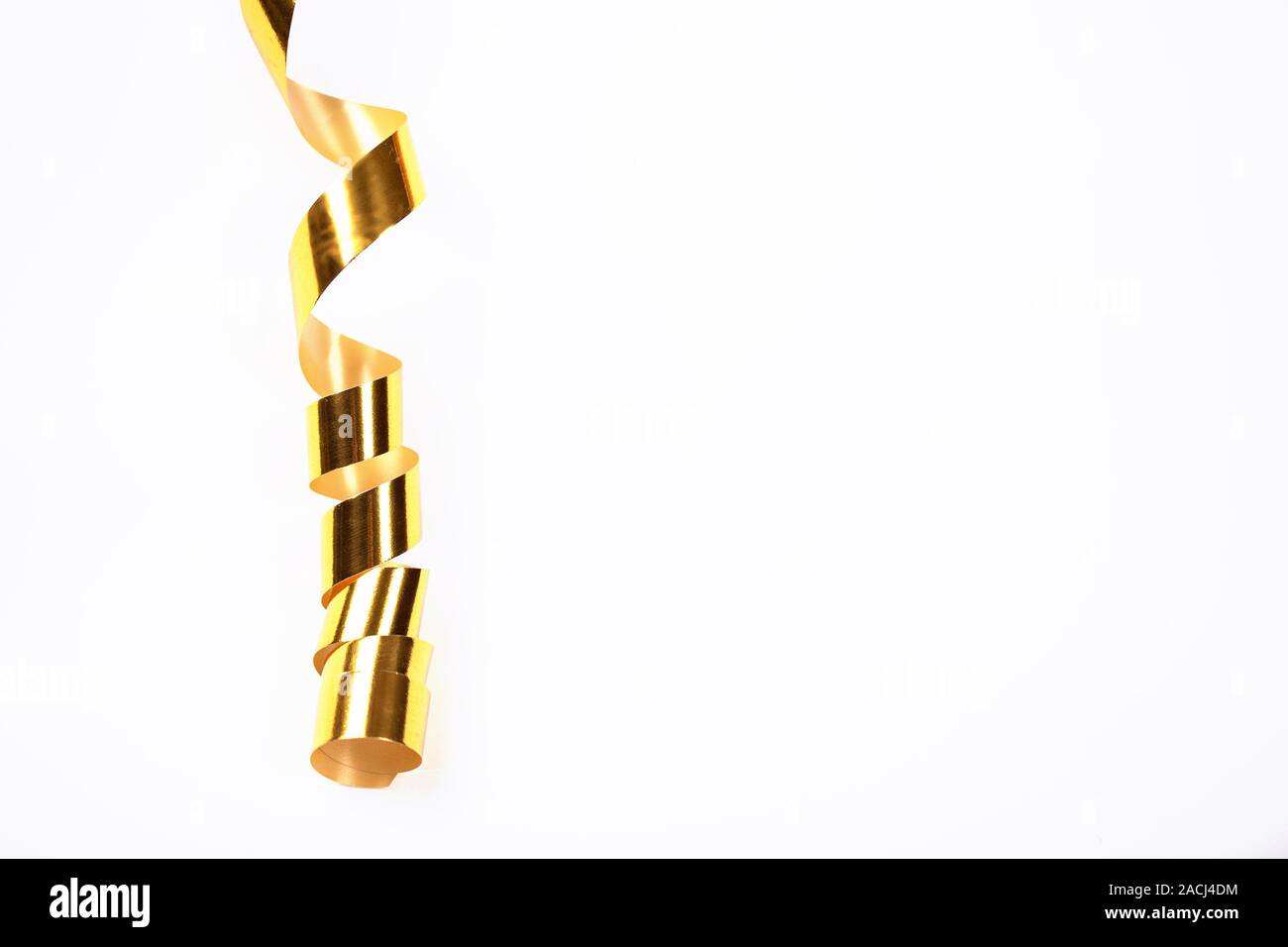 Hanging gold party ribbon confetti hi-res stock photography and images ...