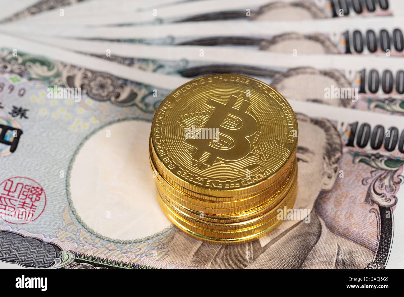 Bitcoin on the Japanese Banknote (Yen Stock Photo - Alamy