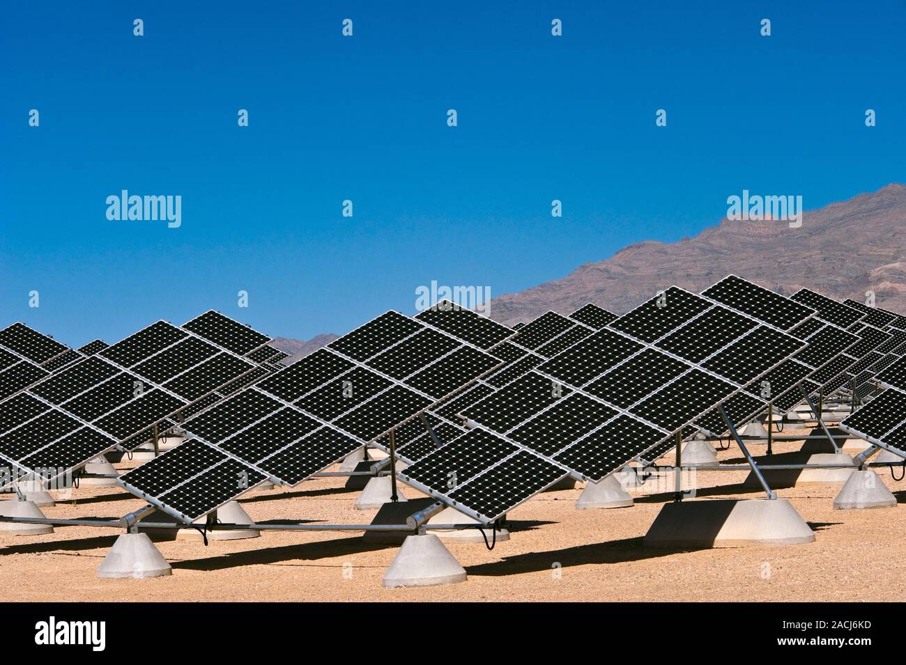 Solar power plant. Rows of photovoltaic arrays at the Nellis Solar ...