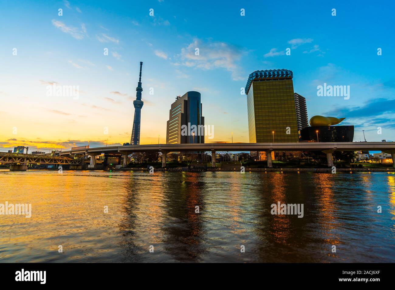 Tokyo skyline on the Sumida River with sunrise, Japan Stock Photo - Alamy