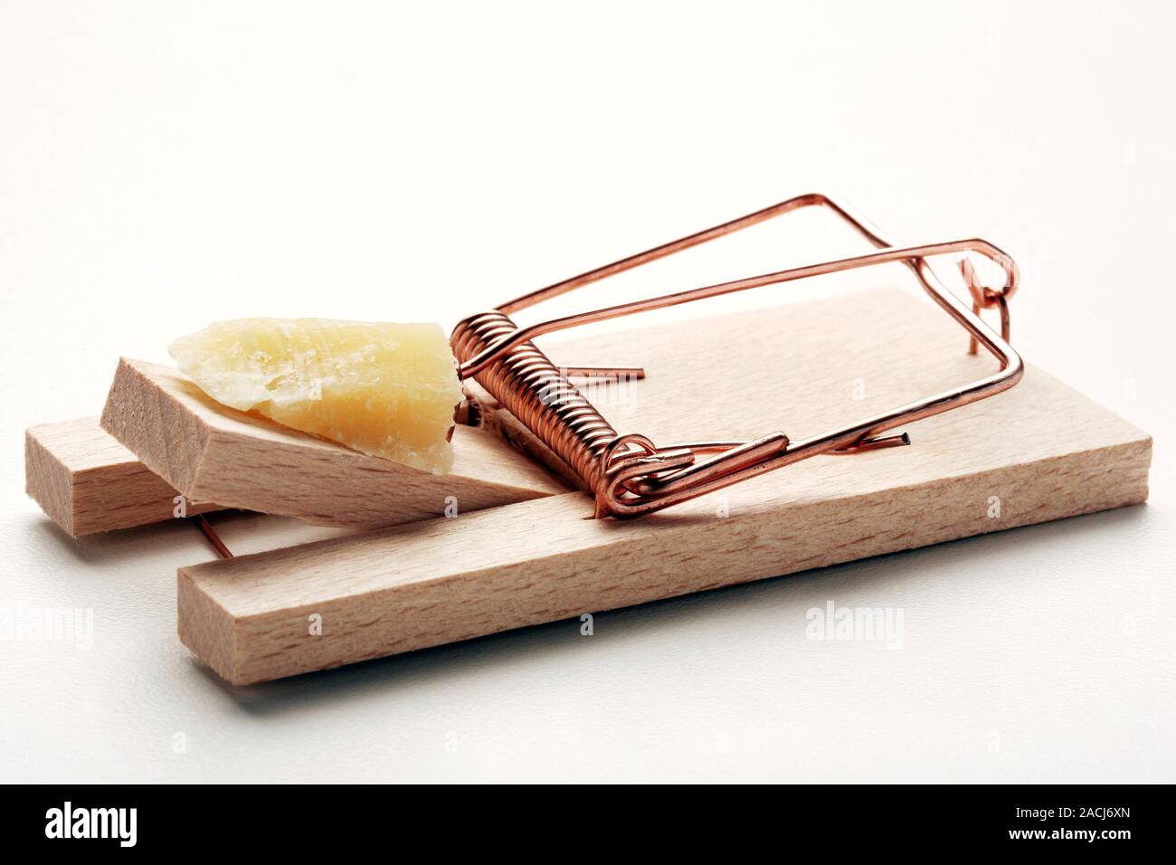 Mouse trap baited with cheese Stock Photo - Alamy
