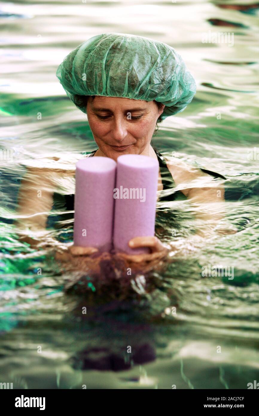 Hydrotherapy. Patient doing exercises in a hydrotherapy pool Stock ...