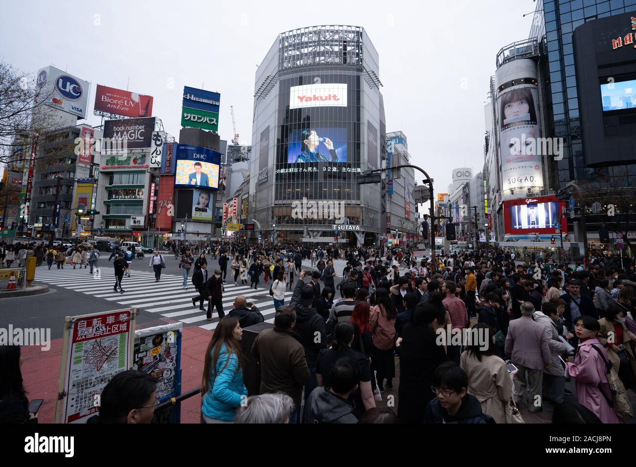 TOKYO , JAPAN - March 25, 2019: crowds of people walking across at ...