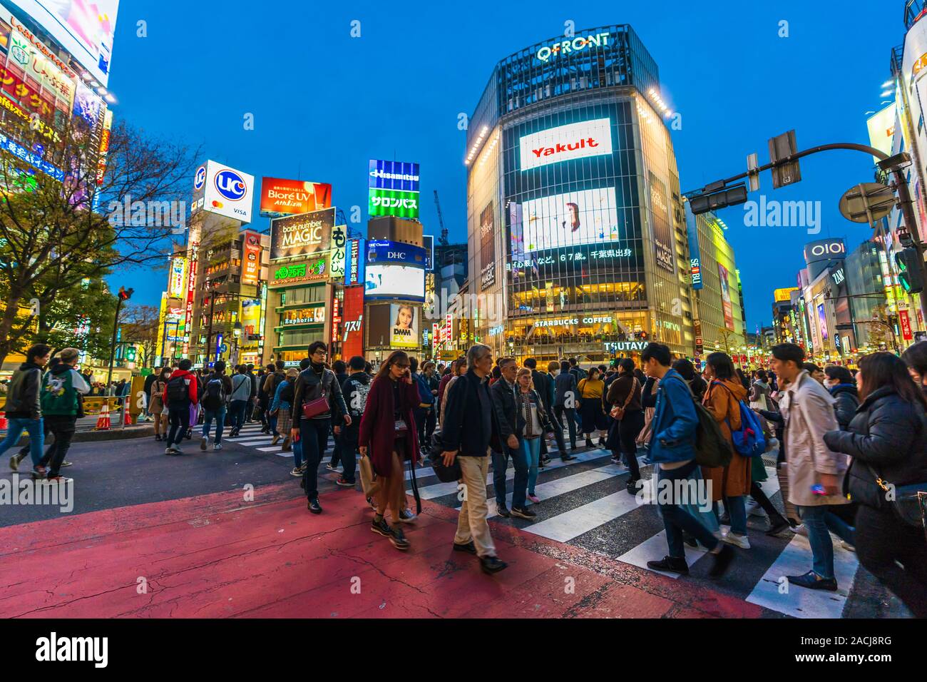TOKYO , JAPAN - March 25, 2019: crowds of people walking across at ...
