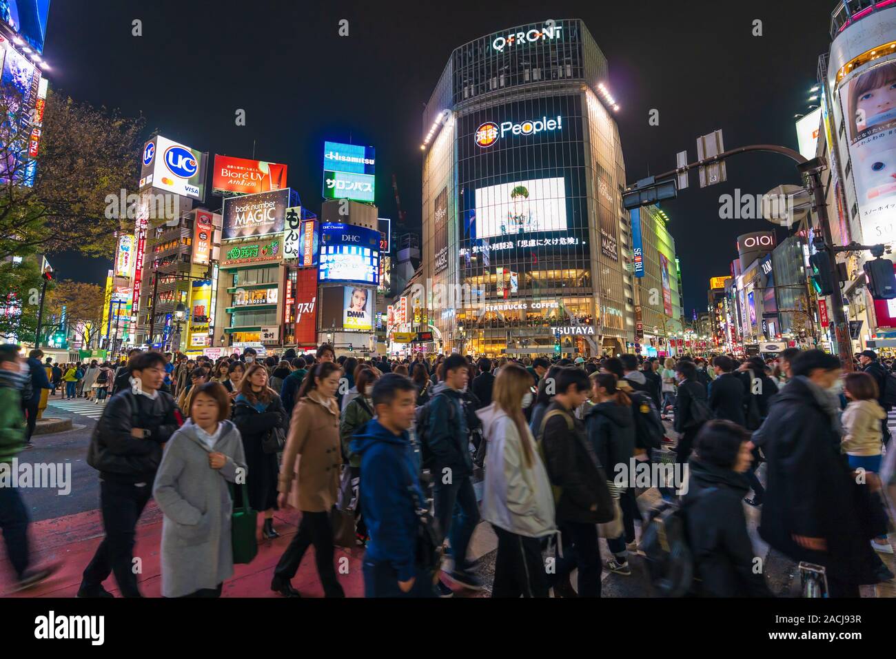 TOKYO , JAPAN - March 25, 2019: crowds of people walking across at ...