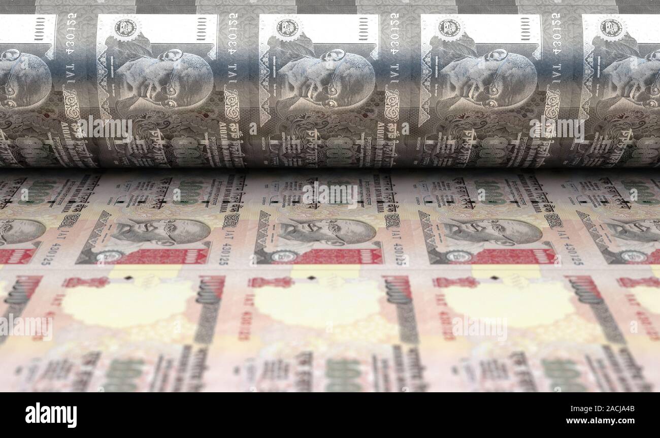 A concept image showing a sheet of indian rupee notes going through a ...
