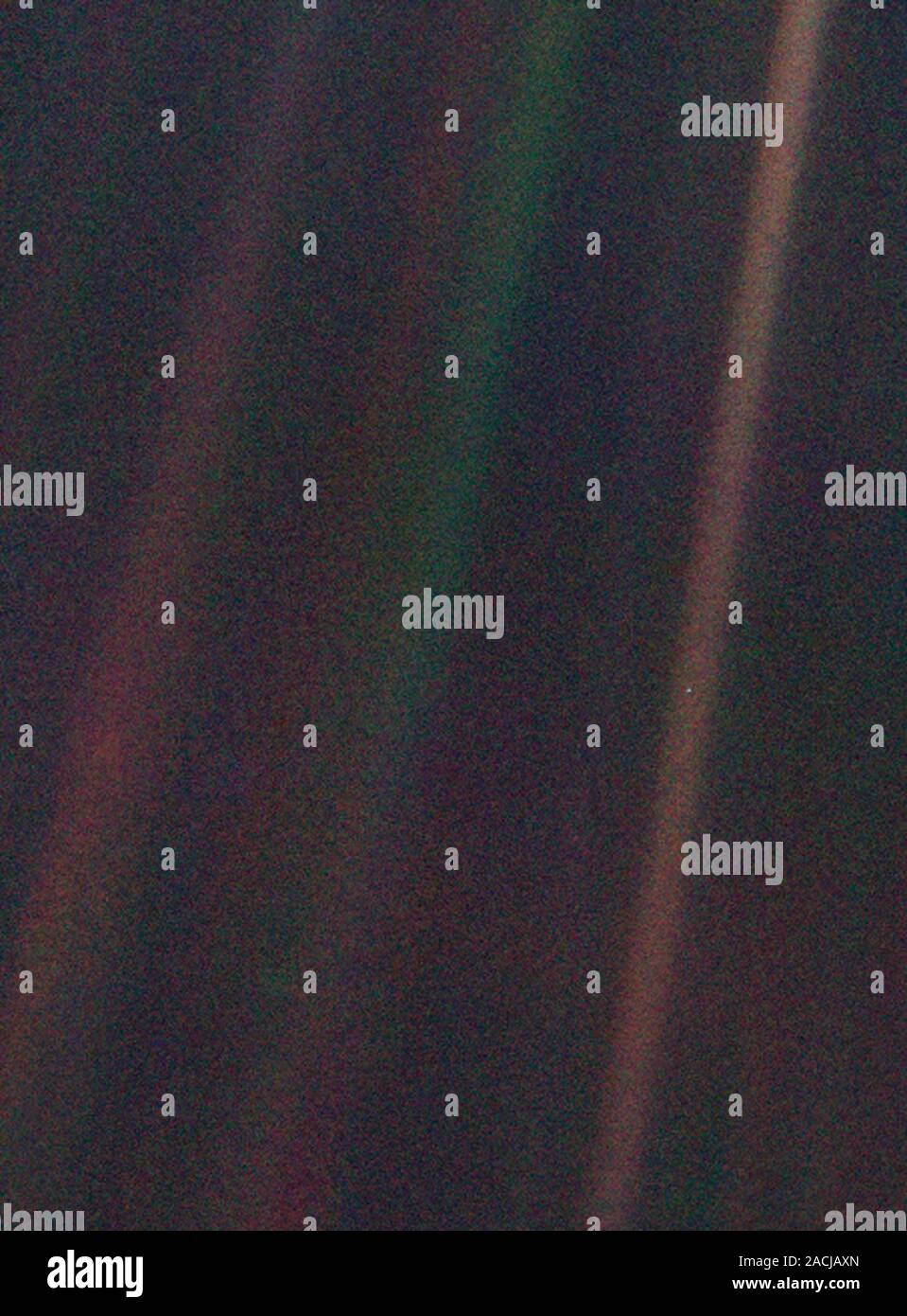 Pale Blue Dot. Image of the Earth taken by the Narrow Angle Camera (NAC) on-board the Voyager 1 ...