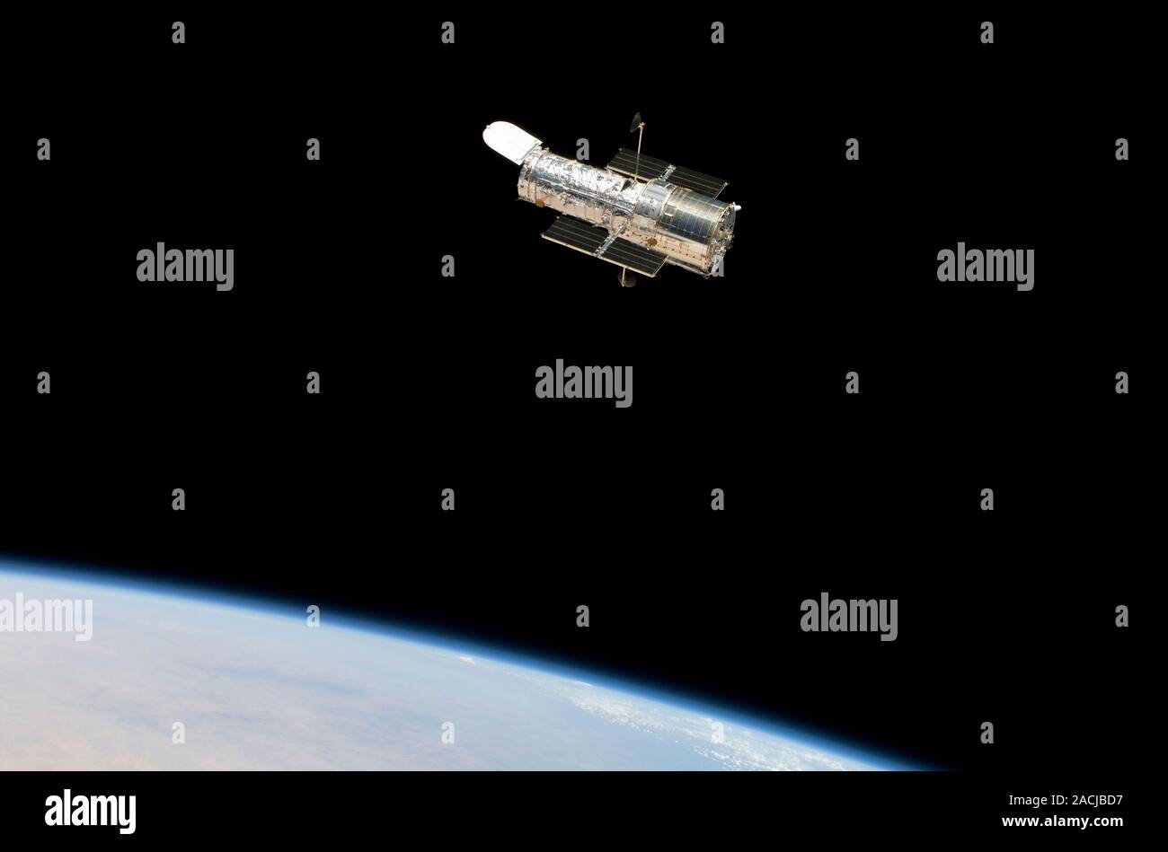 Hubble Space Telescope (HST) in Earth orbit. Image taken from space ...