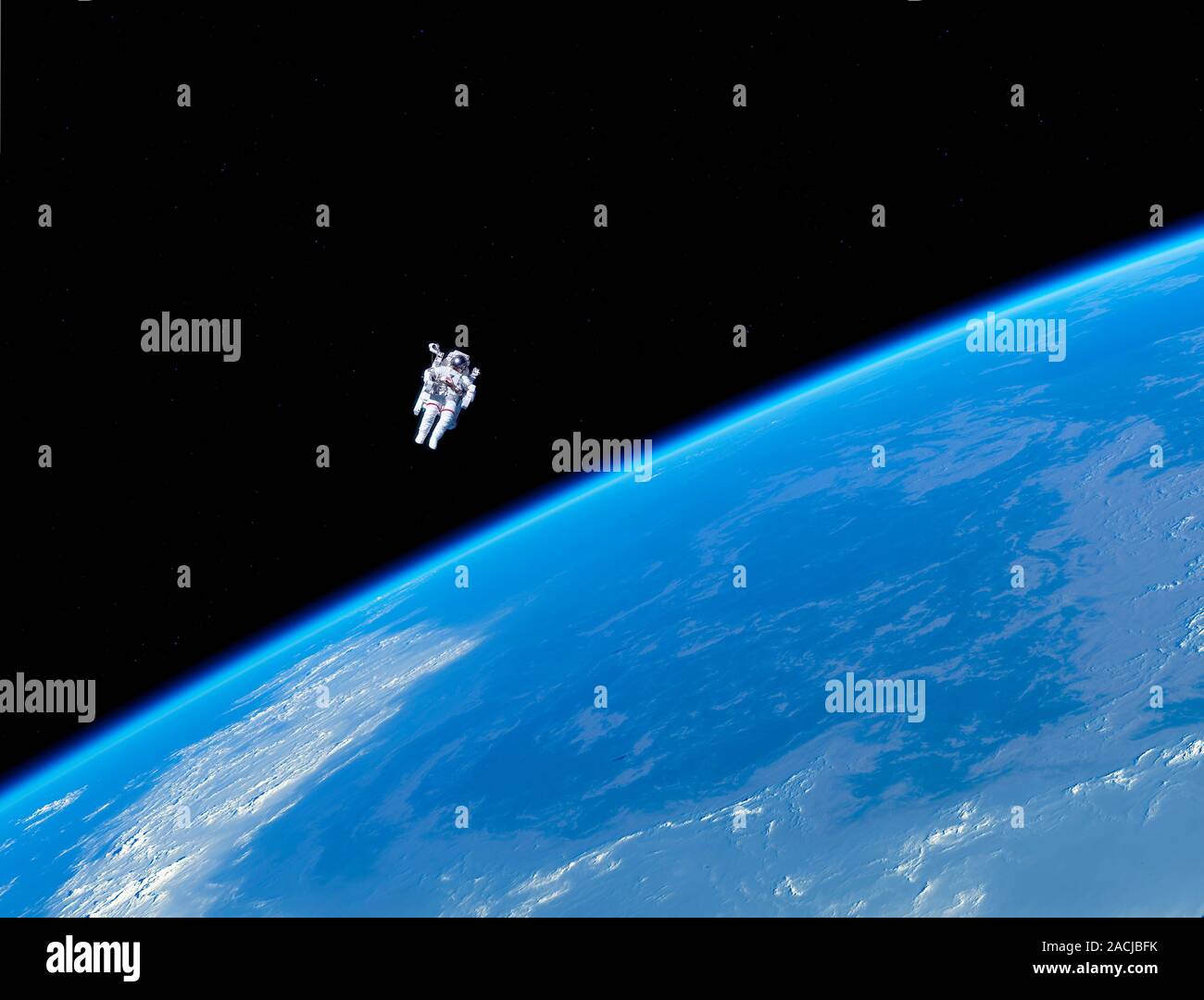 Spacewalk. Astronaut in a Manned Maneuvering Unit (MMU) spacewalking ...
